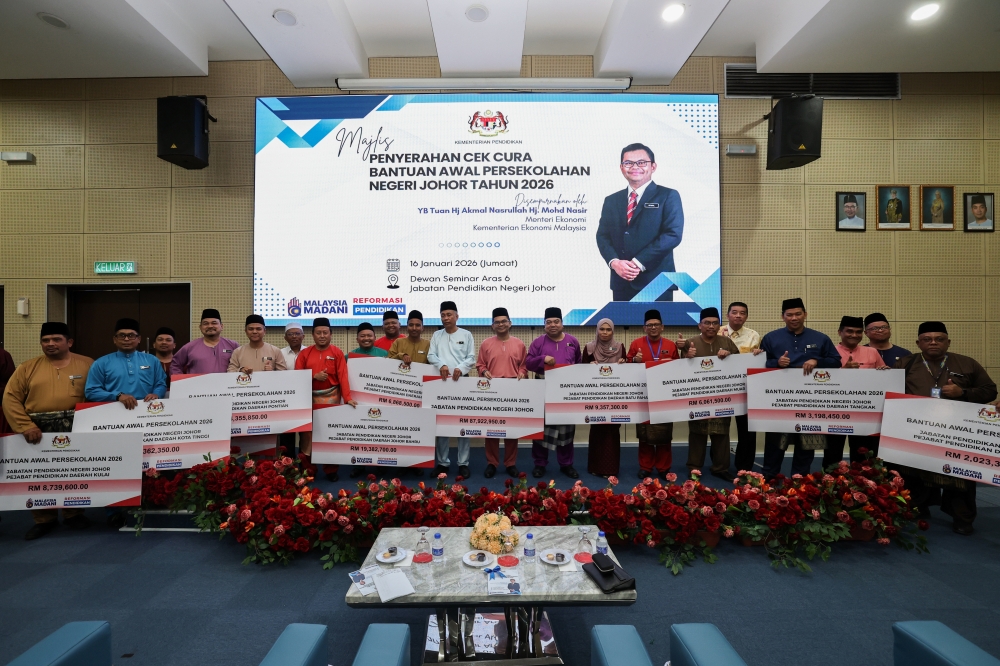 Economy minister cites Malaysia’s schooling aid scheme as model for ...