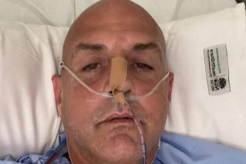Dad paralysed after picking up a shell on day at the beach