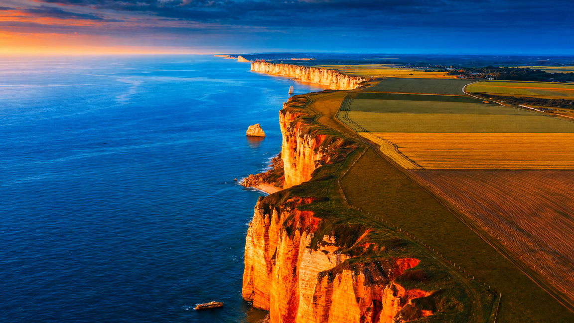 Golden cliffs of France at sunset