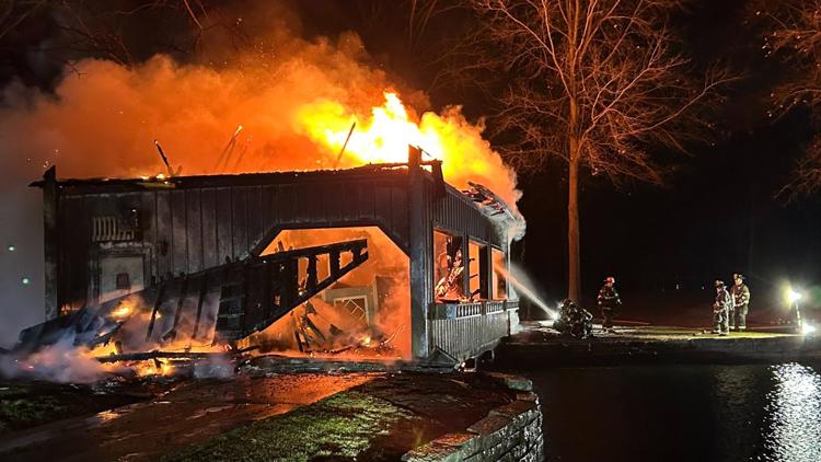 Crews battle building fire over golf course pond at Westfield Country Club
