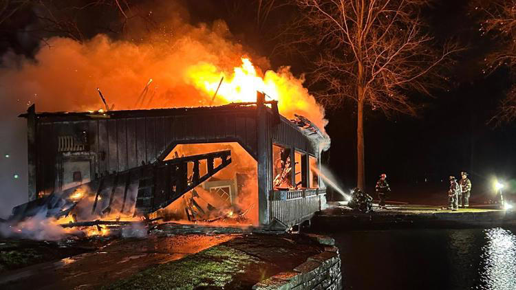 Crews battle building fire over golf course pond at Westfield Country Club