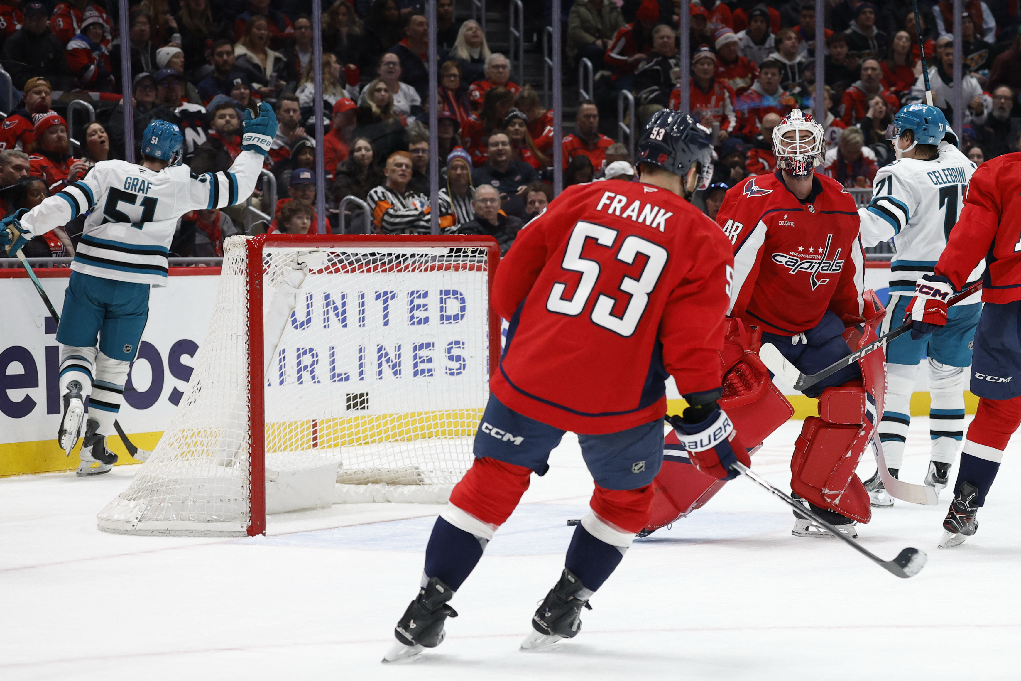 On the ice, the Caps were reeling. On the bench, their coach was raging.