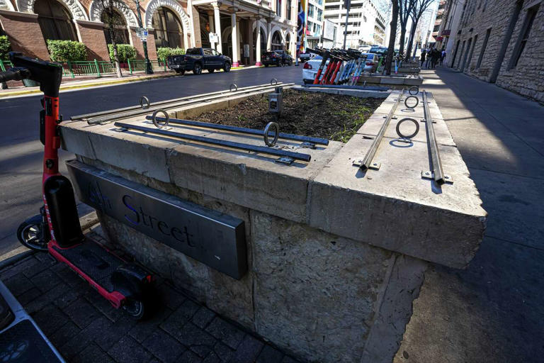 Metal rails appear on downtown Austin planters. The city says it didn't ...