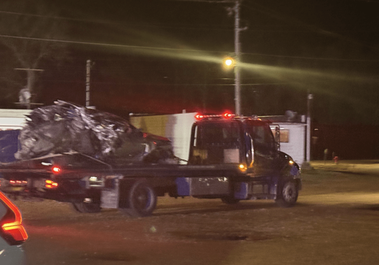 Train collides with car in Millington