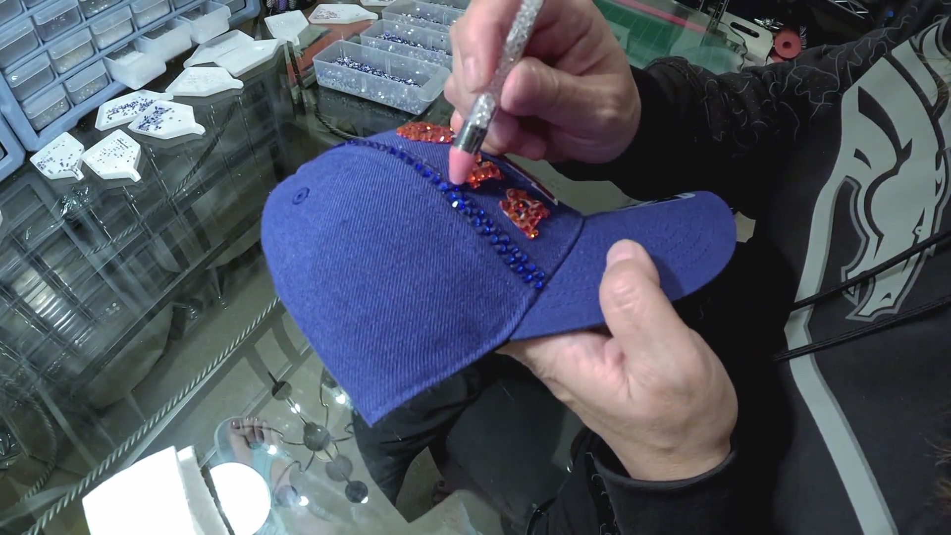 Denver Broncos fan turns love of game into sparkling business