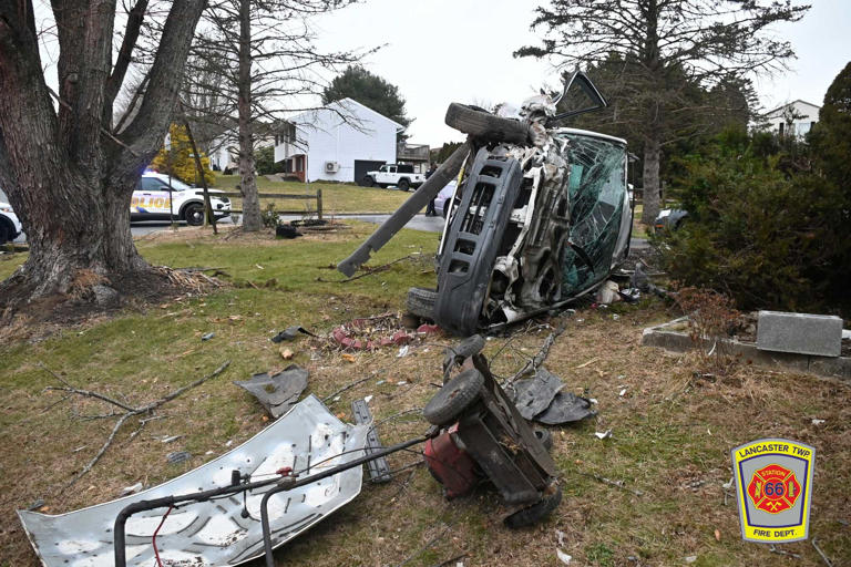 SUV malfunctions, crashes into fence, tree before flipping, fire ...