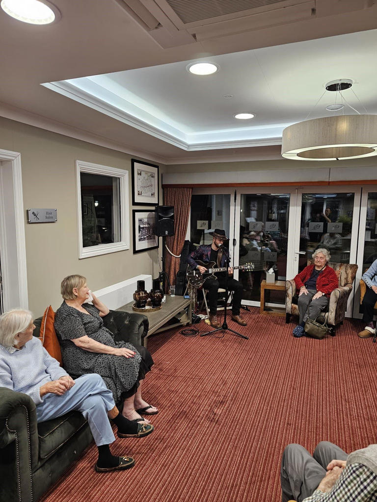 RESIDENTS AT LOCAL CARE HOME LEND THEIR EARS TO LIVE MUSIC PERFOMANCE