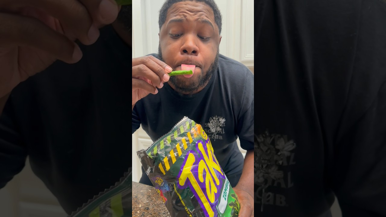 Dad eats zombie Takis with a fake tongue