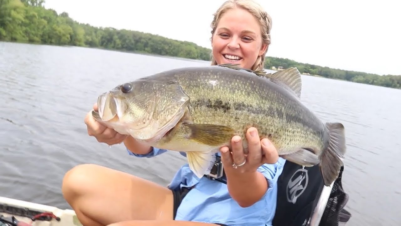 Offshore kayak fishing lands big bass in open water