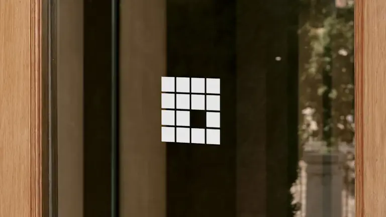 Can you figure out the hidden meaning of this Frank Lloyd Wright logo?