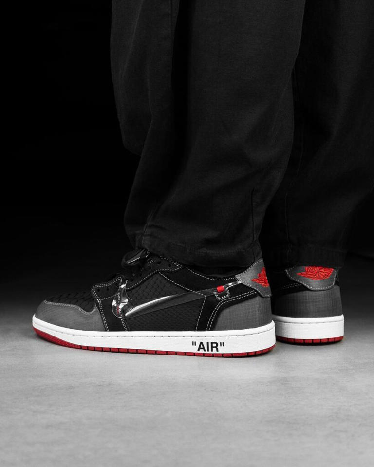 The Off-White x Air Jordan 1 Low 'Ripstop' has a see through Swoosh