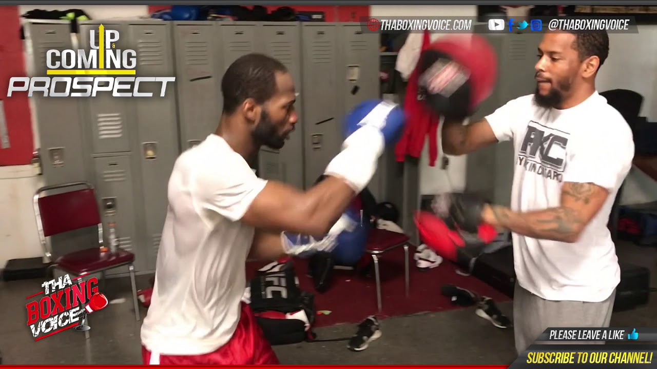 Tsunami Sam Samuel Teah doing pad work in training camp