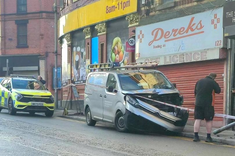 Van 'wipes out traffic lights' at busy junction