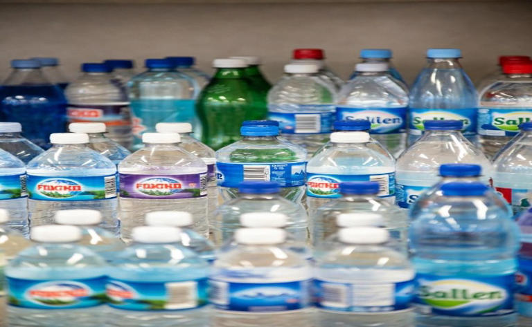 38,000 gallons of bottled water recalled after floating black substance ...