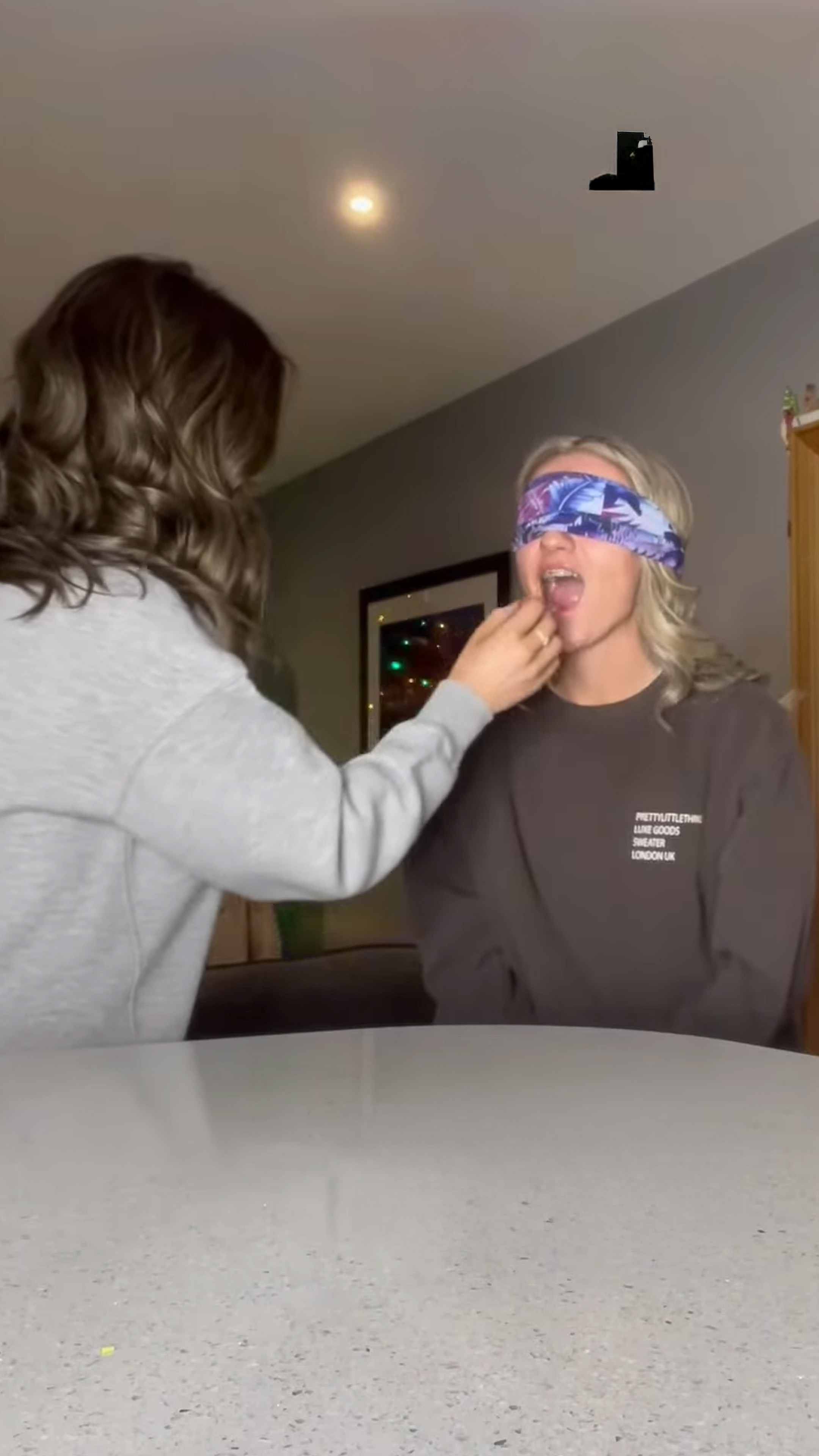 Sibling food tasting and guessing game