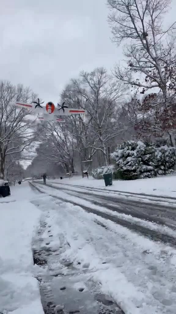 Windy snow day flight with my RC plane