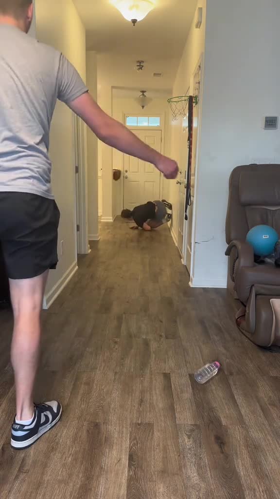 Bottle flip dodgeball showdown in my hallway