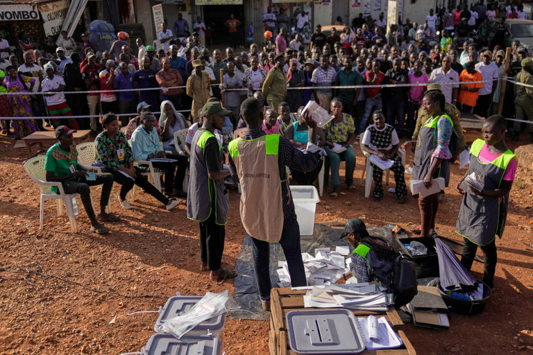 Uganda's president leads in tense election marred by internet shutdown ...