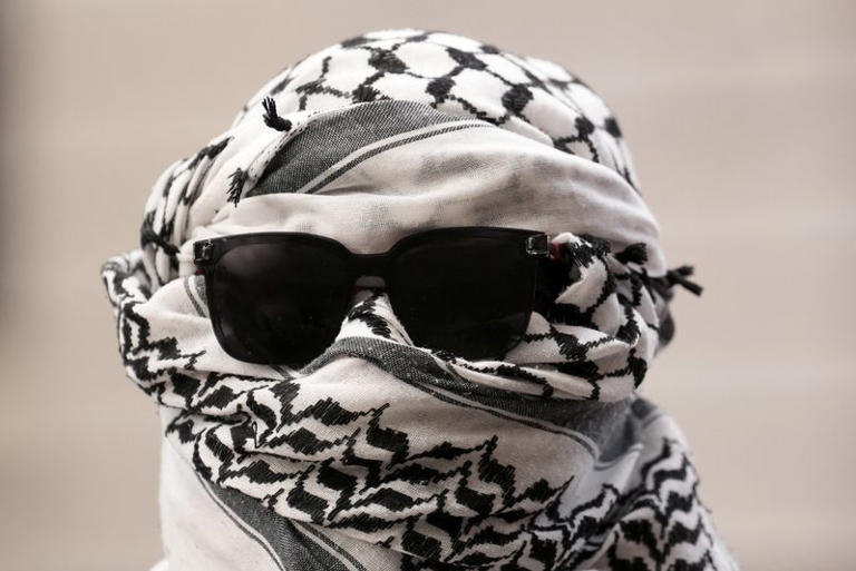 Five pro-Palestinian activists plead not guilty over UK military base ...