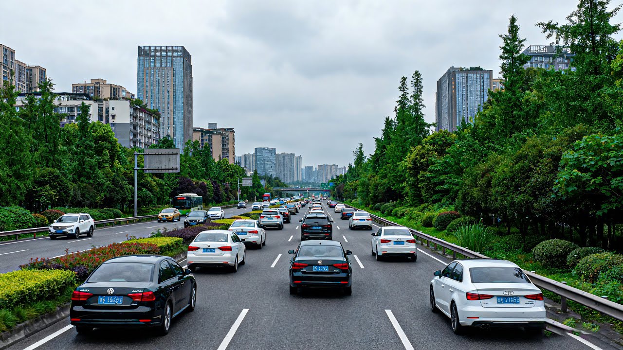 I drove along a highway in China toward a modern city center