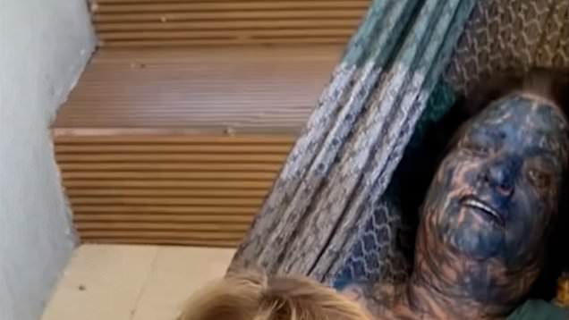 Boy uses grandma as human canvas as she sleeps