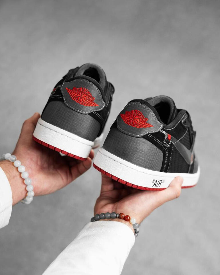 The Off-White x Air Jordan 1 Low 'Ripstop' has a see through Swoosh