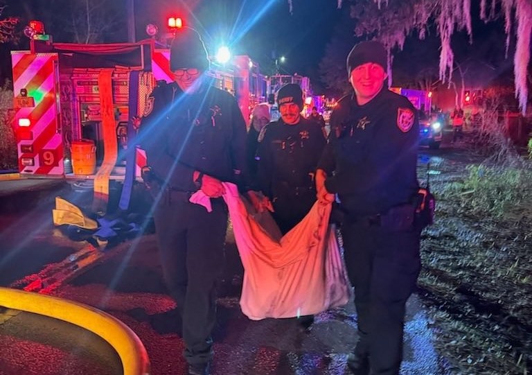 Firefighters rescue 100-pound tortoise while battling Florida house fire
