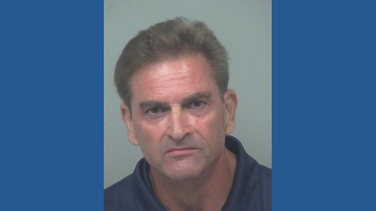 Video shows a man screaming racist slurs at a security guard outside a ...