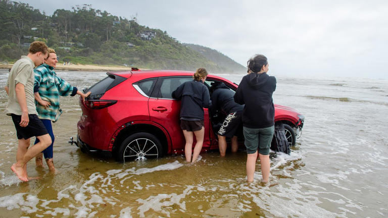 Family watches cars, tents, wallets wash away in floods