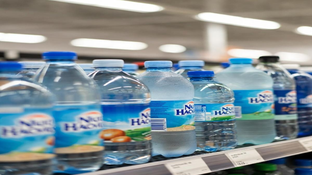 38,000 gallons of bottled water recalled after floating black substance ...