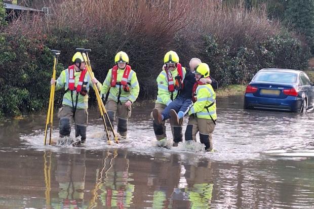 Firefighters rescue man trapped in car filling with water in Essex
