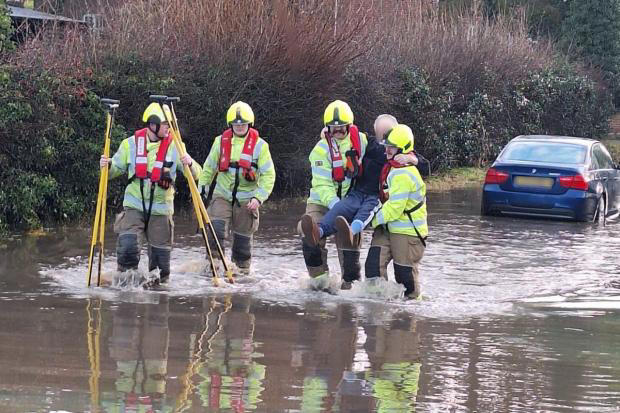Firefighters rescue man trapped in car filling with water in Essex