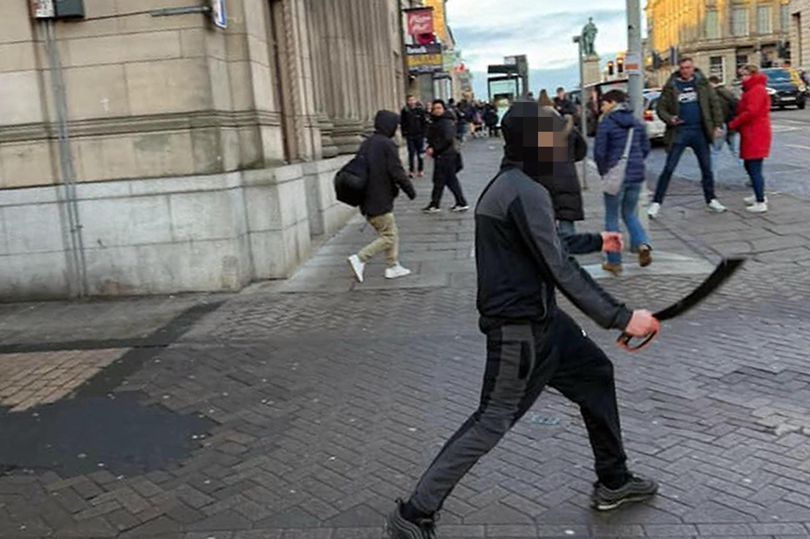 Youth with huge machete seen walking through Edinburgh city centre