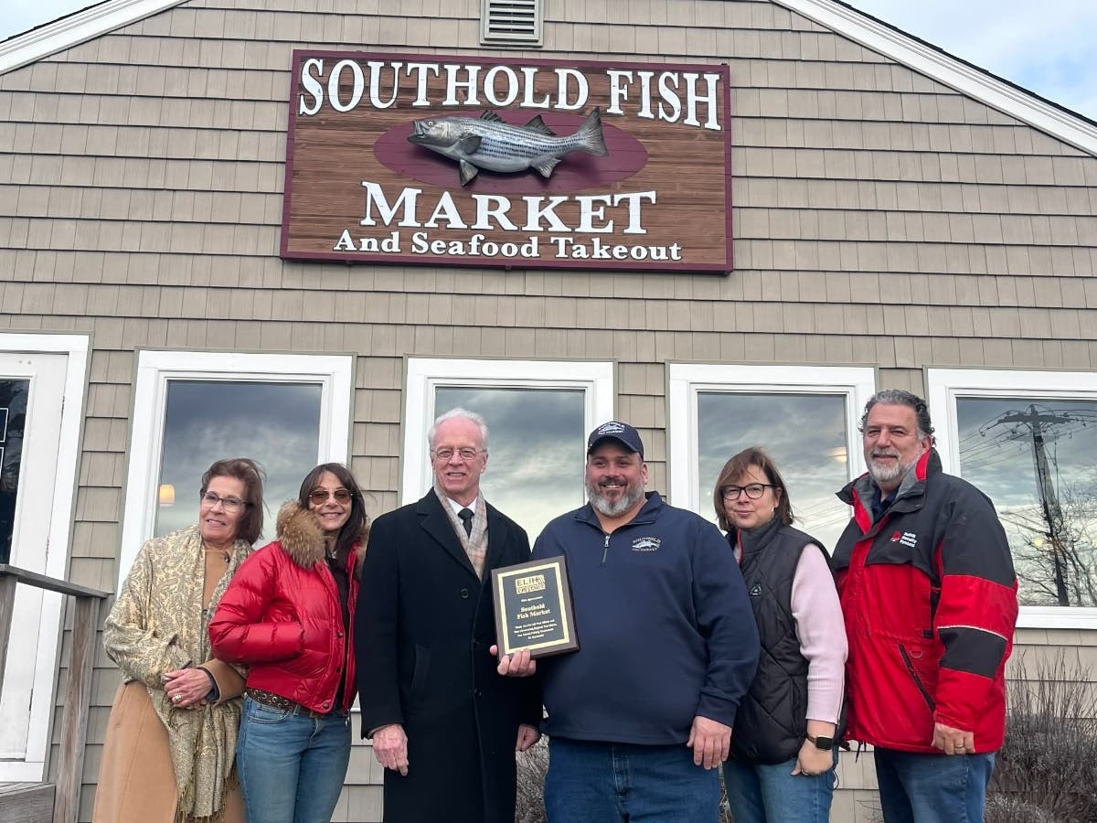 Community hero Charlie Manwaring of Southold Fish Market honored by ...