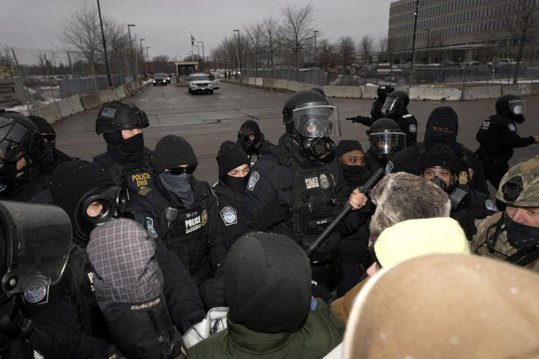 Emergency calls reveal chaos after Minneapolis ICE shooting as city ...