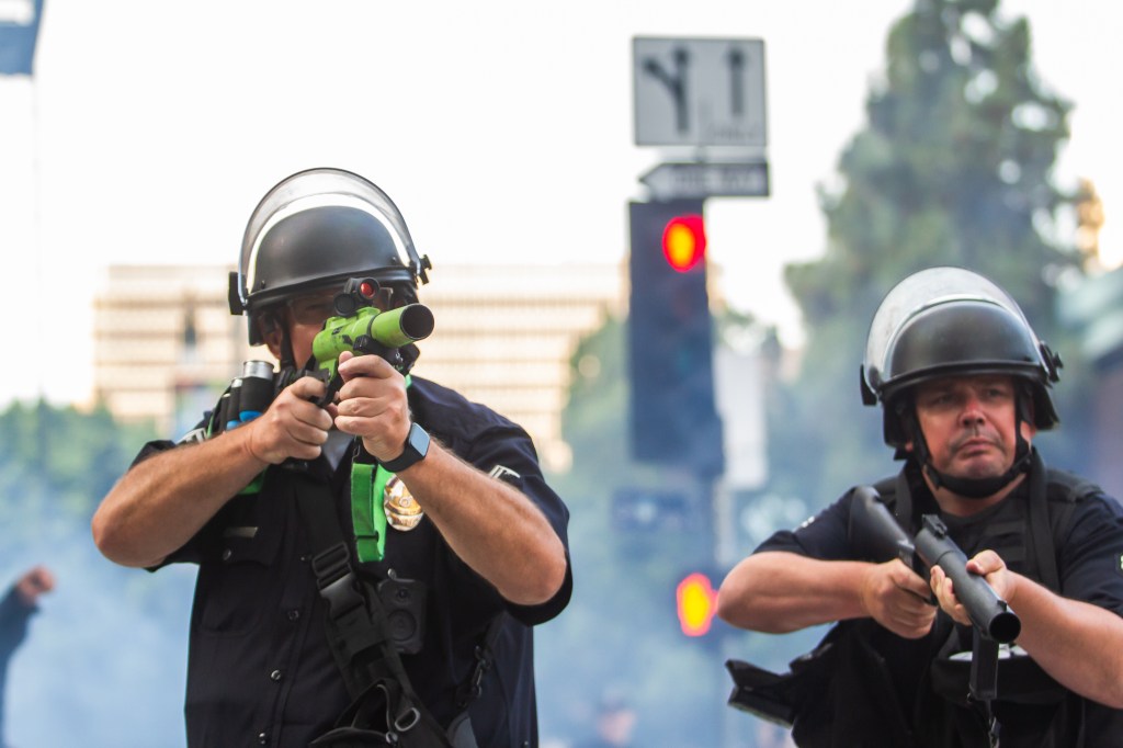 Judge bans LAPD from using non-lethal weapons to control violent anti ...