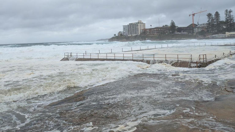 Huge surf swallows Sydney beach