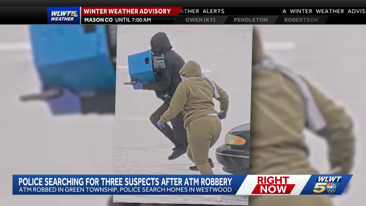 Photos show suspects fleeing with cash, gun after ATM robbery