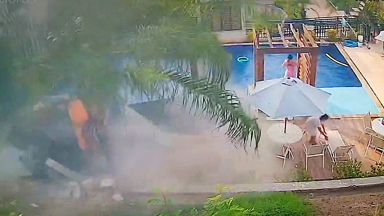 Out-of-control tractor crashes into pool as children run