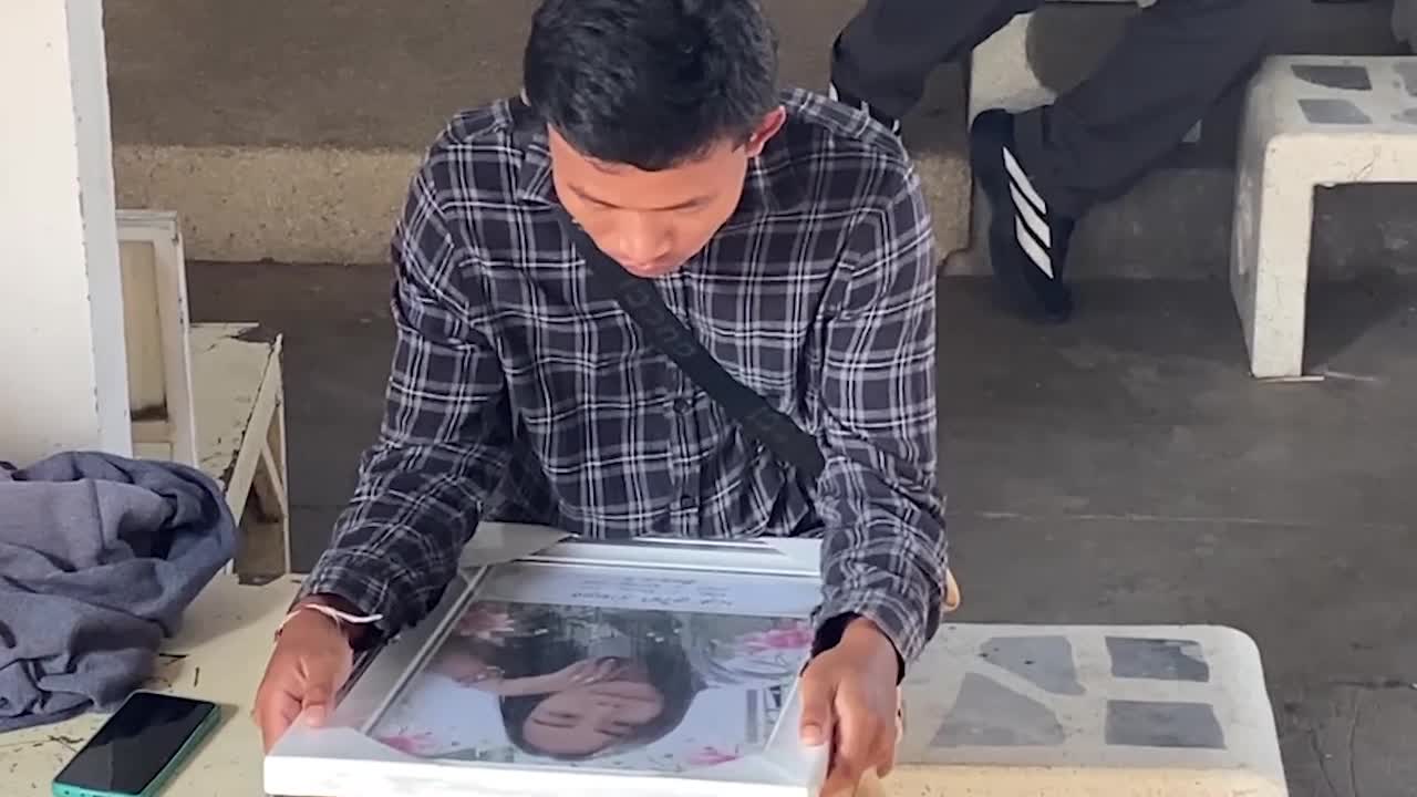 Grieving families collect bodies from Thailand train tragedy