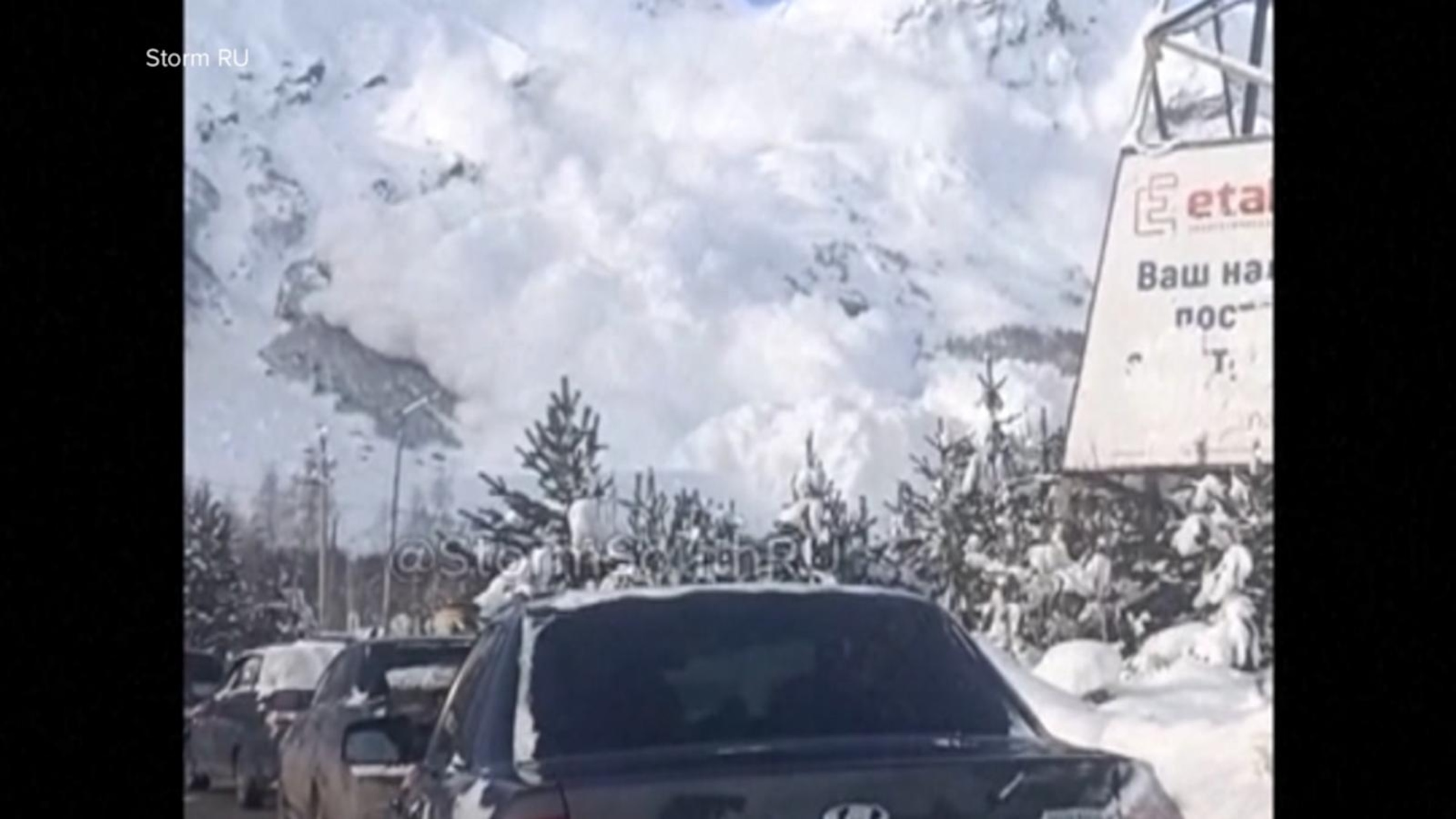Video shows moment controlled avalanche roars down Russian mountainside
