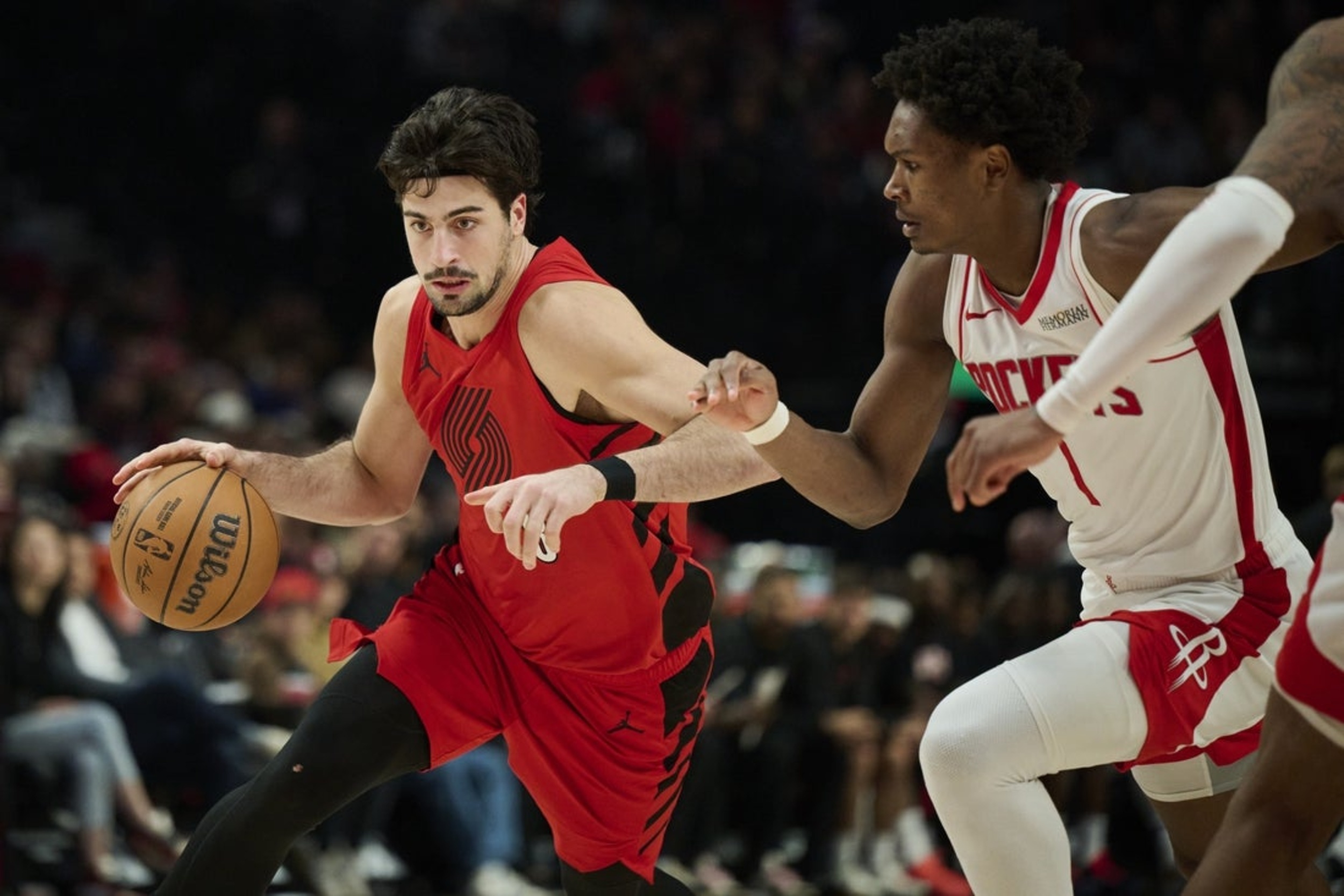 Trail Blazers star Deni Avdija (back) could miss third straight game