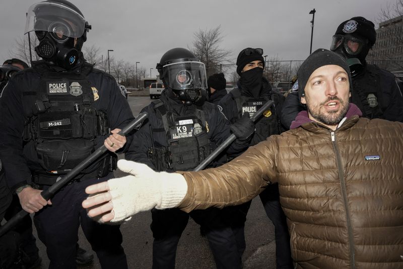 Emergency calls reveal chaos after Minneapolis ICE shooting as city ...