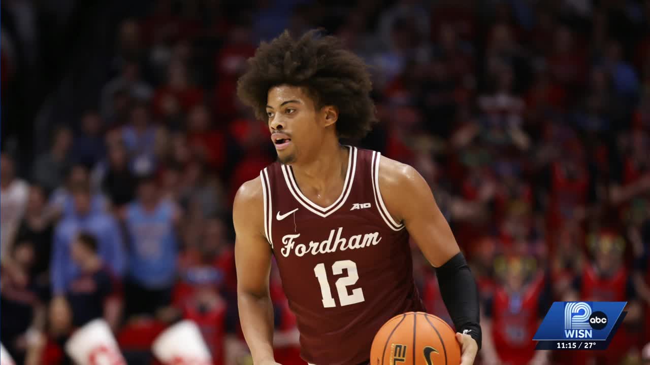 Former Wisconsin Badger charged in point-shaving scheme