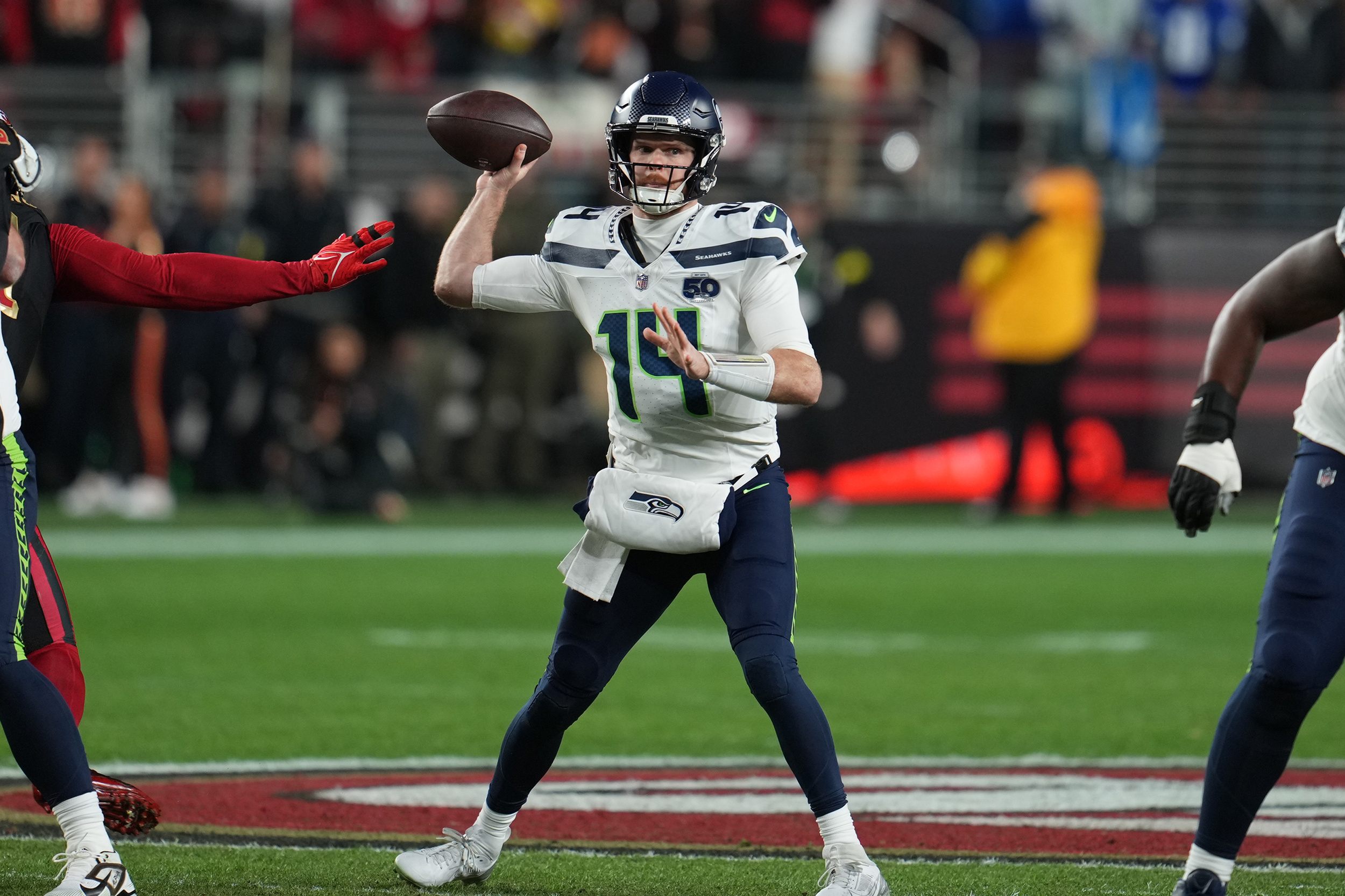 Seahawks’ Sam Darnold battling oblique injury, expected to play in ...