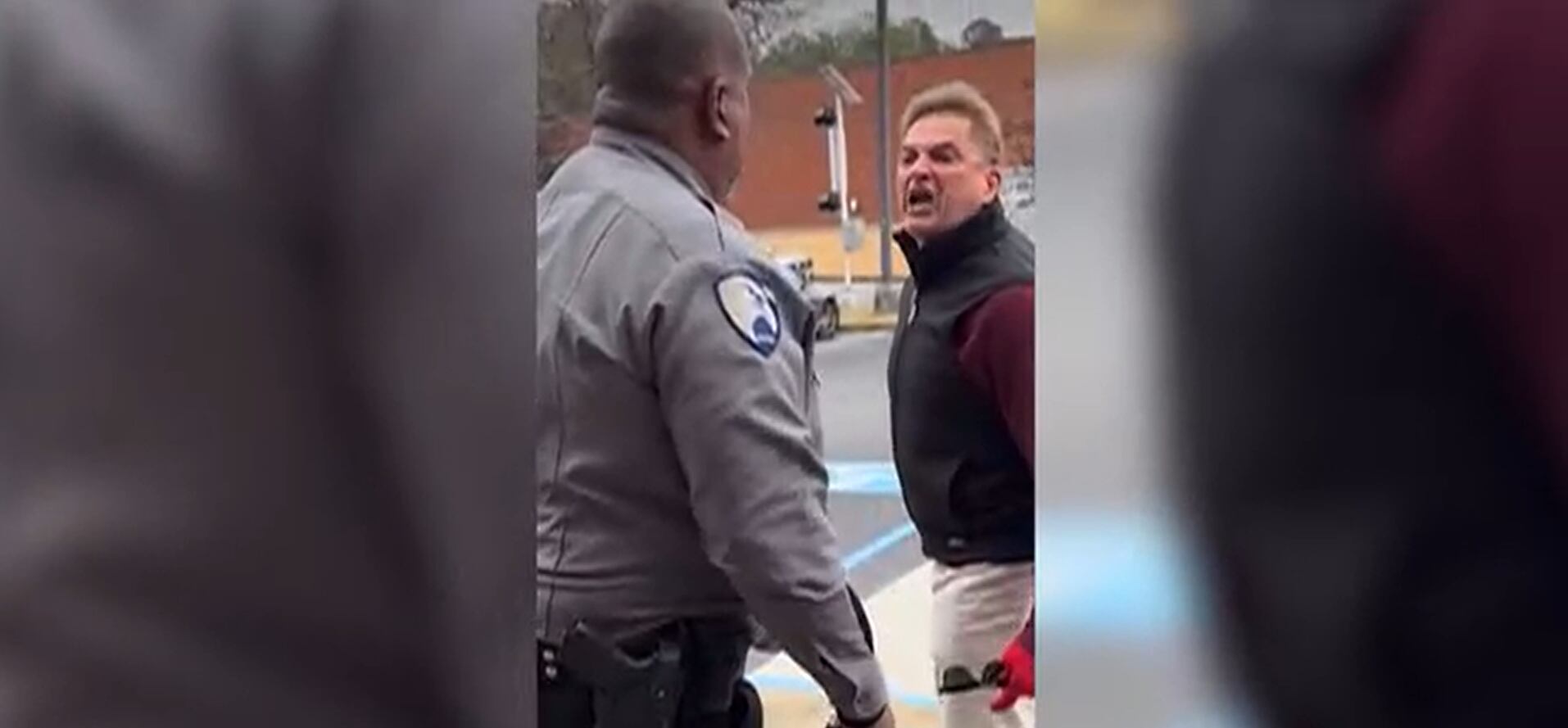 Man seen on viral video shouting racist slurs at security guard in ...