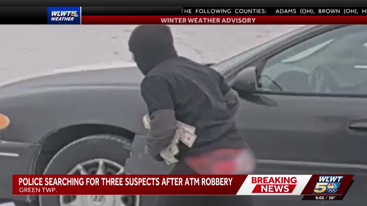Photos show suspects fleeing with cash, gun after ATM robbery on ...