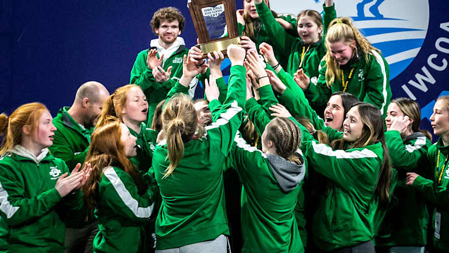 Iowa high school wrestling coach placed on leave