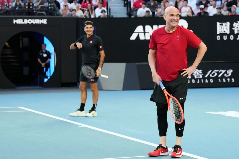 Andre Agassi leaves court after comment during Roger Federer match at ...