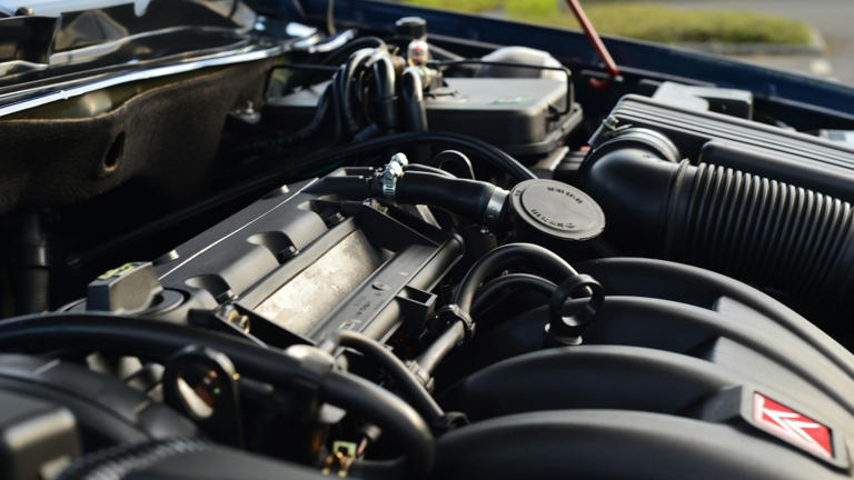Why automakers abandoned metal valve covers for plastic despite durability